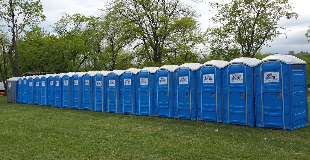 Line Of Toilets Events - Johnny Blue